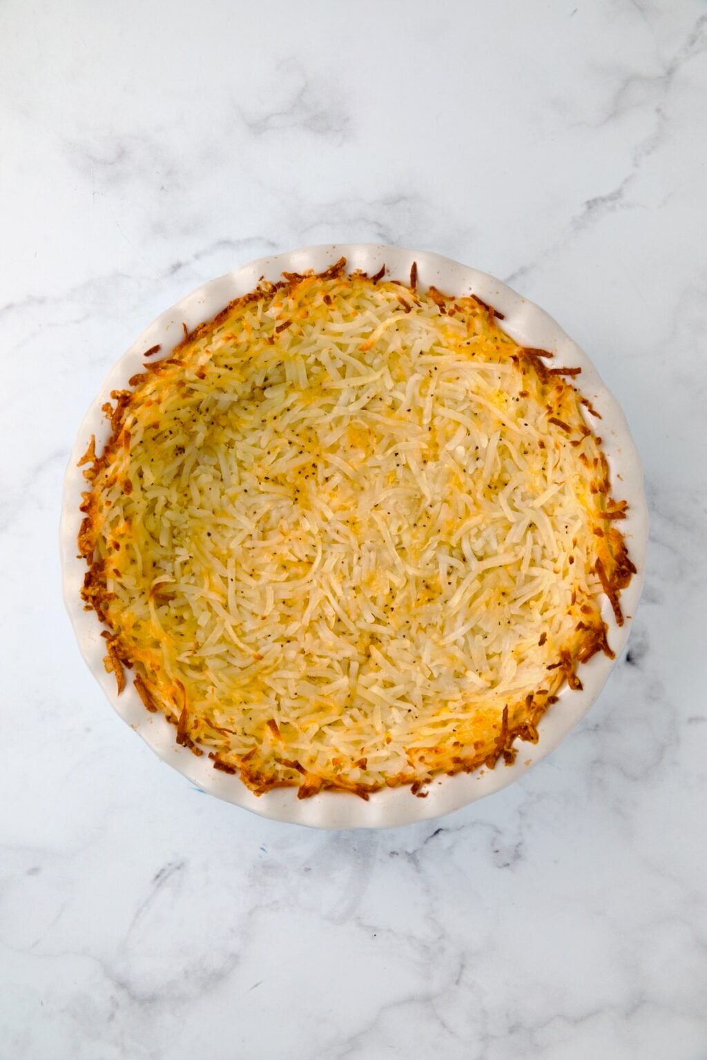 Savory Brunch Delight: Quiche with Hash Brown Potato Crust